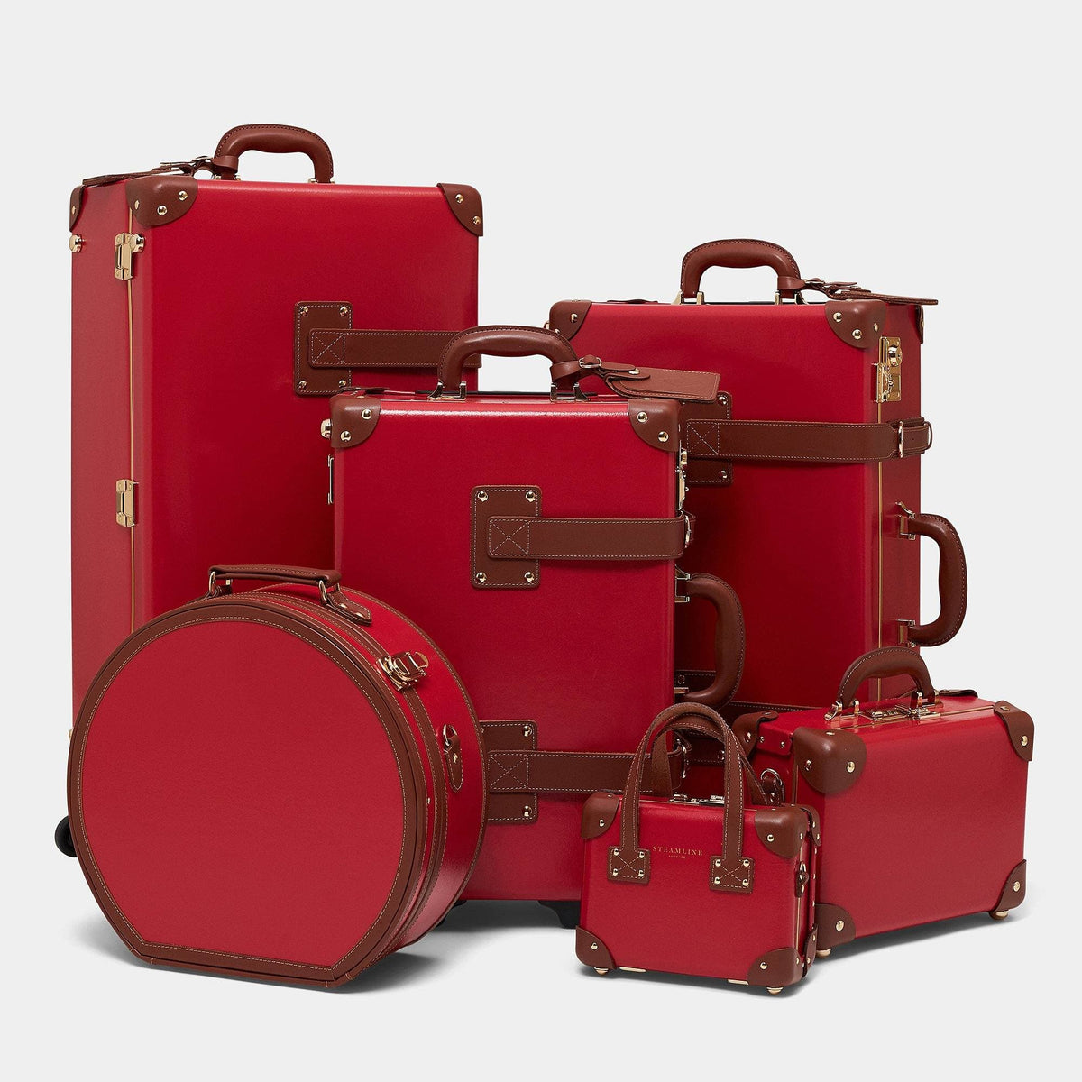 Shop our red leather Carry-On suitcase | SteamLine: The world's most ...